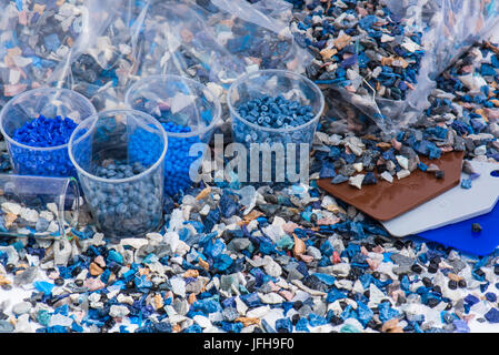 Virgin material and milled regrind of polymer plastic resin Stock Photo ...