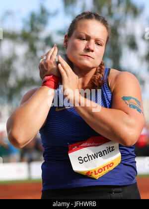 German shot putter Christina Schwanitz presents her silver medal during ...