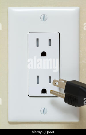 Electrical Outlet cut out on white background Stock Photo - Alamy
