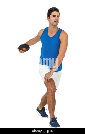 Male athlete playing discus throw on white background Stock Photo - Alamy