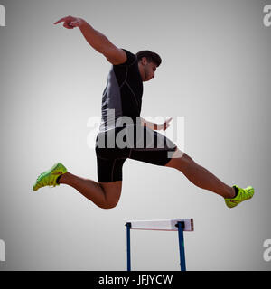 Composite image of athletic woman practicing show jumping Stock Photo ...
