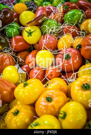 Fresh ripe delicious brown yellow tomatoes. Background from freshly ...
