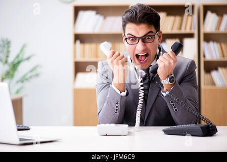 Angry helpdesk operator yelling in office Stock Photo - Alamy