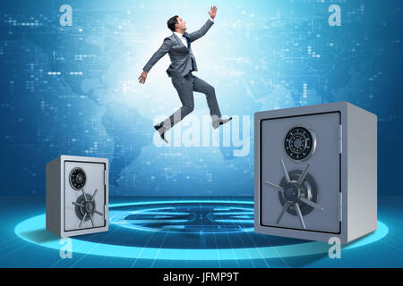 The businessman jumping from safes in business concept Stock Photo - Alamy