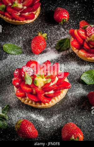homemade strawberry Galette with fresh ripe strawberries on a dark ...