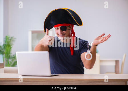 The digital security concept with pirate at computer Stock Photo - Alamy