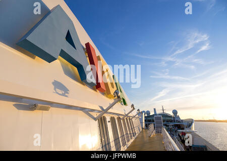 AIDA logo at the funnel of cruise ship AIDAsol. AIDA Cruises is one of ...