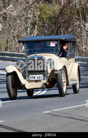 Vintage 1924 Dodge 4 Tourer driving on country roads near the town of ...