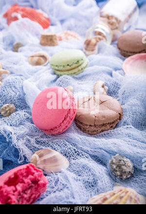 Sweet almond macaron or macaroon dessert cake colored in trendy color ...