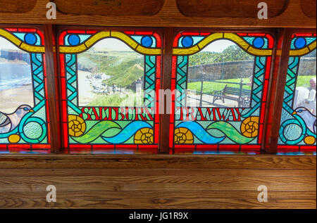 Stained glass window of Saltburn Funicular Tramway, with view of town ...