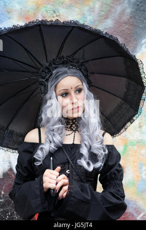 Woman dressed in gothic clothes, scary halloween Stock Photo - Alamy