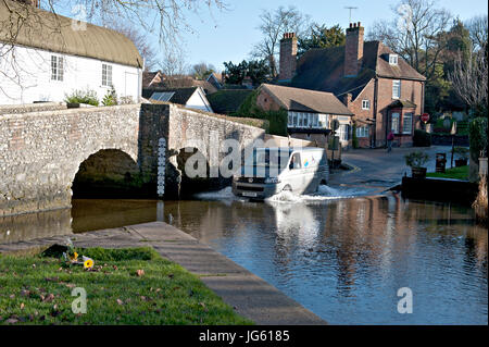 A ford over the river Darent, with a picturesque hump-back bridge ...