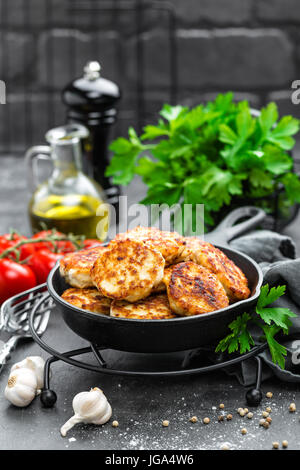 Homemade chicken cutlets and fresh greens. Plate full of delicious ...