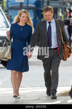 Conservative MP Craig Mackinlay with his wife Kati arrive at Southwark ...