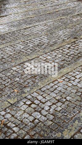 Wallpaper area paved with stones Stock Photo - Alamy