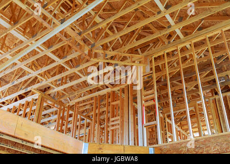 A stick built house under construction New build with wooden truss ...