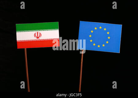 Flags of EU and Iran on Black background, EU vs Iran Smoke Flags Stock ...