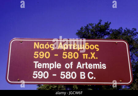 Greece, road sign and ruin of an old windmill Stock Photo - Alamy