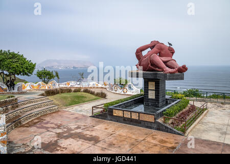 Peru, Lima. Love Park (Parque del Amor). Couple in front of "The Kiss ...