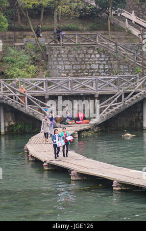 Hunan, China - Nov 6, 2015. People visit Fenghuang Old Town in Hunan ...
