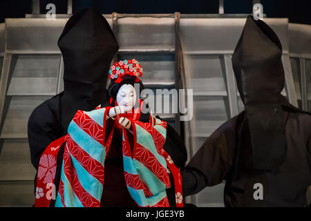 Bunraku, a traditional Japanese puppet theater, on the float is ...