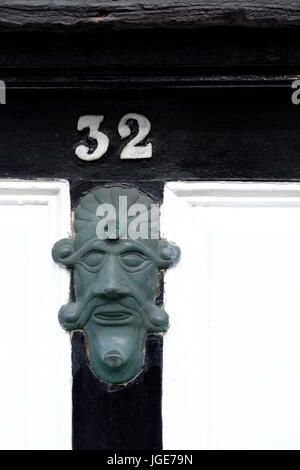 Door number 32 Stock Photo - Alamy