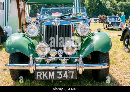 A classic British Racing Green MG-TA roadster sports car with bonnet ...