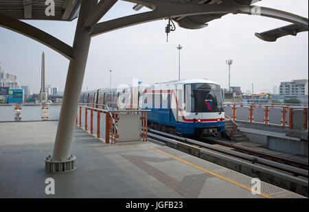 BTS Skytrain arriving at Victory Monument station. Bangkok, Thailand ...