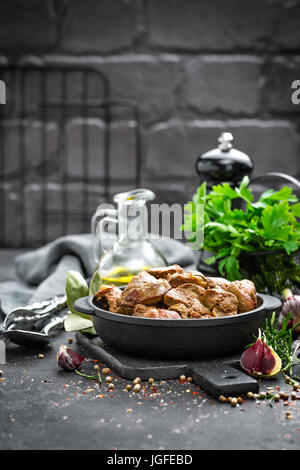 roasted pork and innards with chicken liver stab in wooden stick on ...