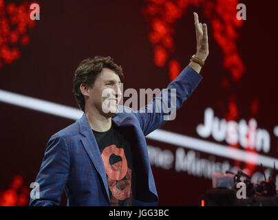 Prime Minister Justin Trudeau waves as he leaves the offices of ...