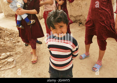 Khiva, Uzbekistan - March 08, 2009: Poverty in Uzbekistan. Little child ...