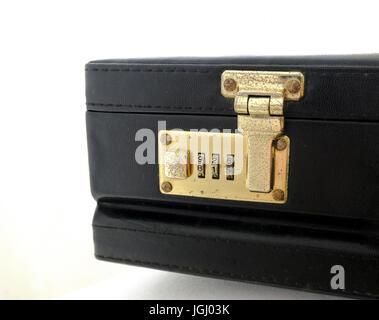 old briefcase with security lock combination number Stock Photo - Alamy