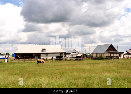Rural farm buildings in Russia during the summer sun Stock Photo - Alamy