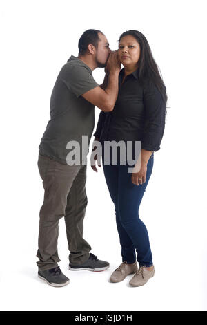 To tell secrets in the ear Stock Photo - Alamy