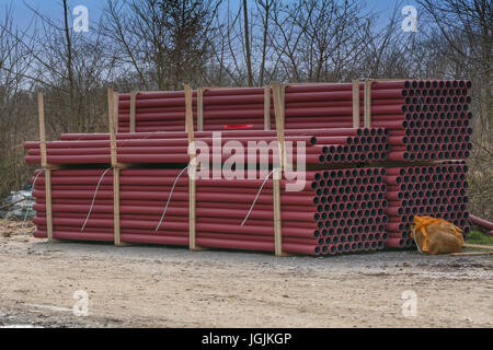 Temporary storage of various plastic pipes Stock Photo - Alamy