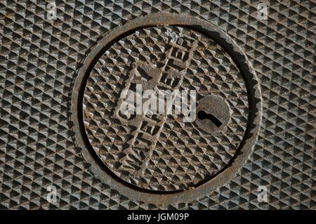 Metal cover of a water meter Stock Photo: 73585633 - Alamy