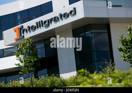 A logo sign outside of the headquarters of Intelligrated in Mason, Ohio ...