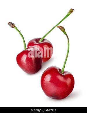 Several ripe sweet cherries in a white ceramic plate, close-up ...