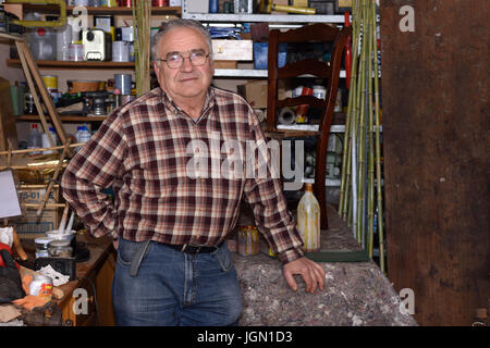 poportrait of a retired carpenter in his workshop Stock Photo - Alamy