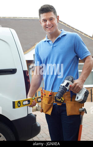 Portrait Of Builder With Van Outside House Stock Photo - Alamy