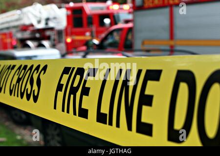 Yellow Fire Line Barrier Tape Stock Photo - Alamy