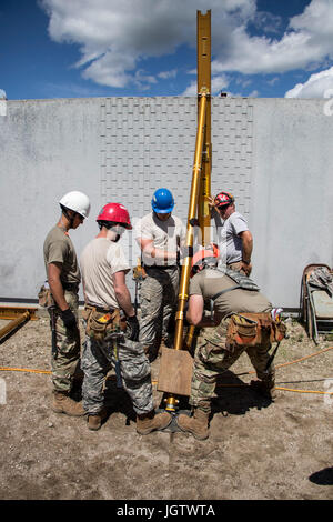 Soldiers with the 1049th Firefighting Detachment (FFTD) install the ...