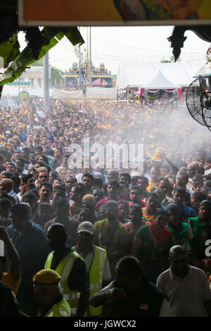 Huge crowd lining up at the entrance going up the batu cave temple ...