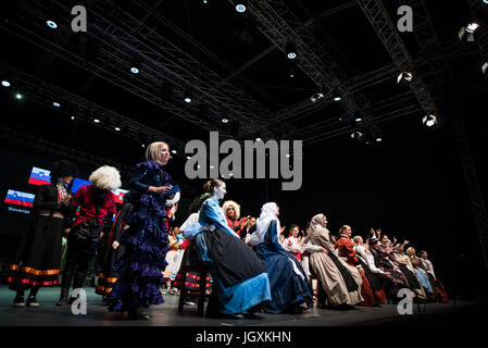 Georgian dancers dancing a folklore dance show on stage in Tbilisi ...