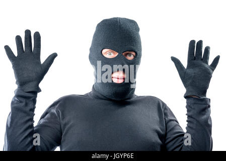 Criminal terrorist with hands up isolated on white background Stock ...