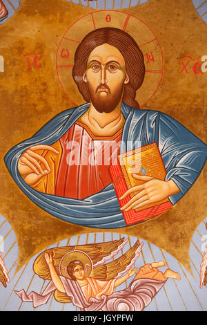 The fresco of Jesus on the ceiling of a an Orthodox Church. Dome ...