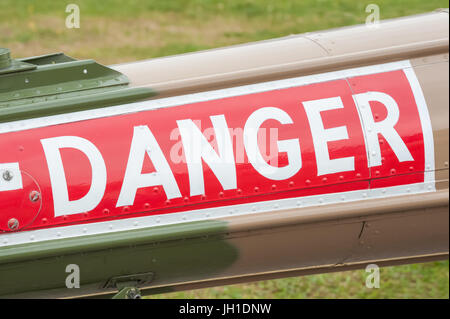 Danger sign on helicopter panel Stock Photo - Alamy