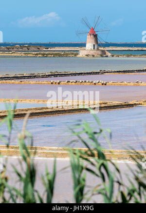 Saltpans and windmills in the Stagnone lagoon between Marsala and ...