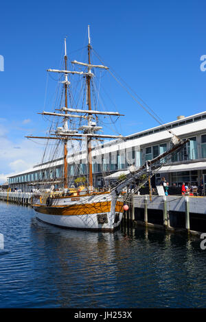Square rigged ship Lady Nelson sailing on the Derwent River in Tasmania ...