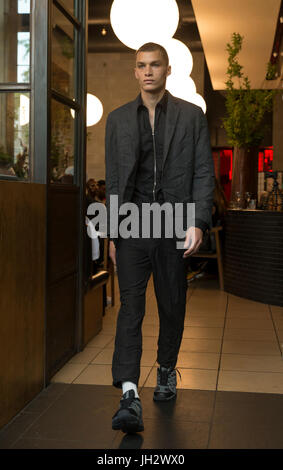 A model walks the runway during the Andrea Crew Menswear Spring/Summer ...